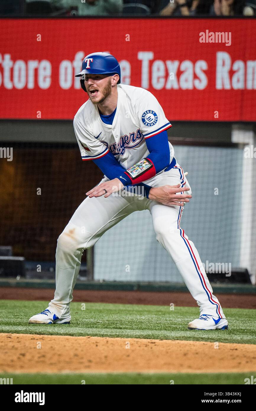Texas Rangers' Jonah Heim celebrates a run in the sixth inning of a ...
