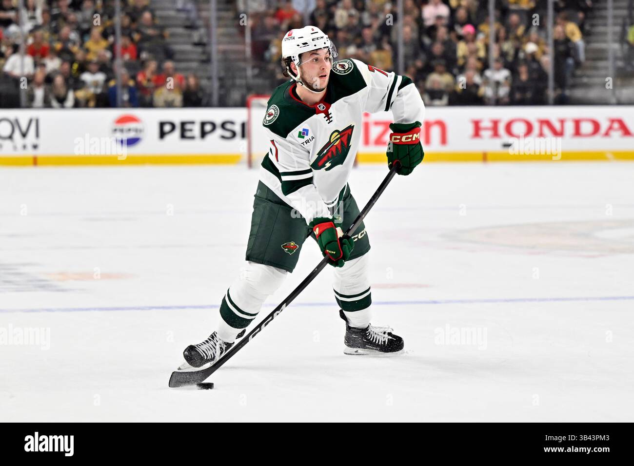 Minnesota Wild defenseman Brock Faber (7) lines up a shot against the ...