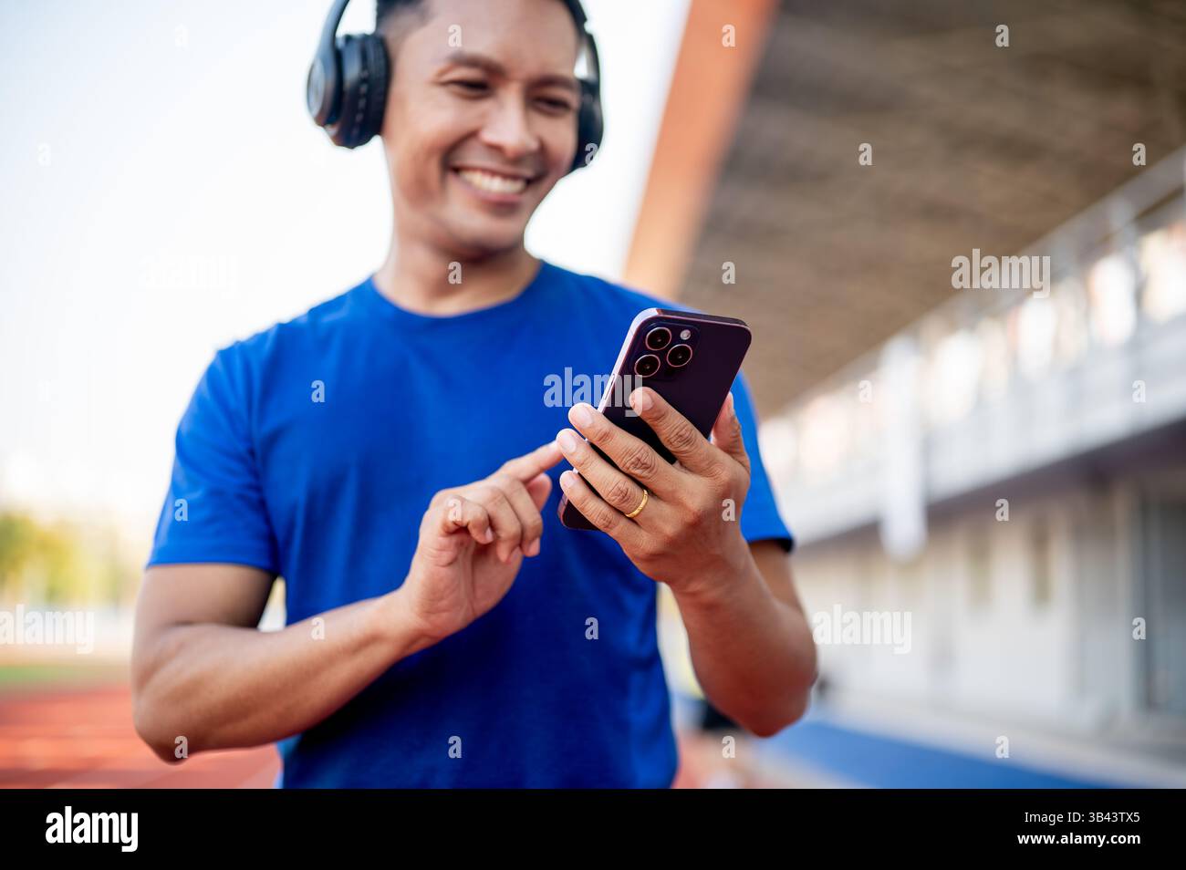 Tapping asian man wearing hi-res stock photography and images - Alamy