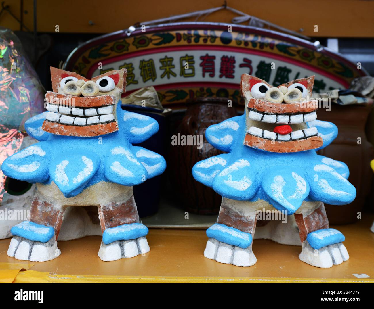 Colorful Shisa statues displayed at a pottery shop on Tsuboya Yachimun ...