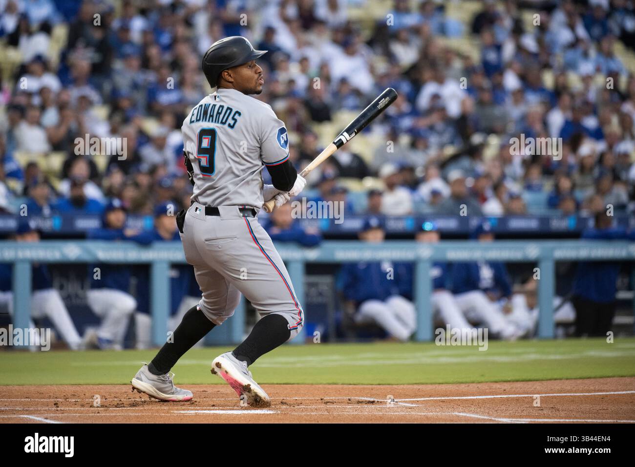 Miami Marlins' Xavier Edwards tracks his triple during the first inning ...