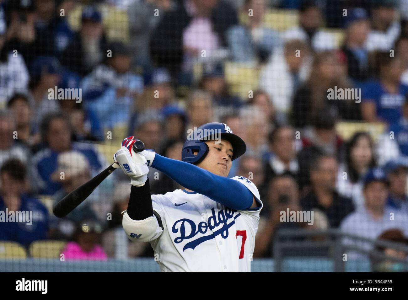 Los Angeles Dodgers' Shohei Ohtani swings in the on-deck circle during ...