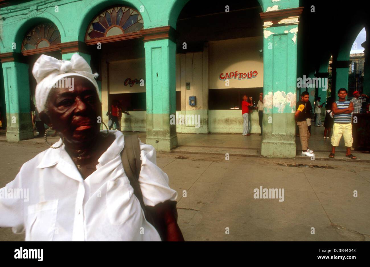 May 16, 2015 - Cuba - Woman santera passing the Capitolio Nacional ...