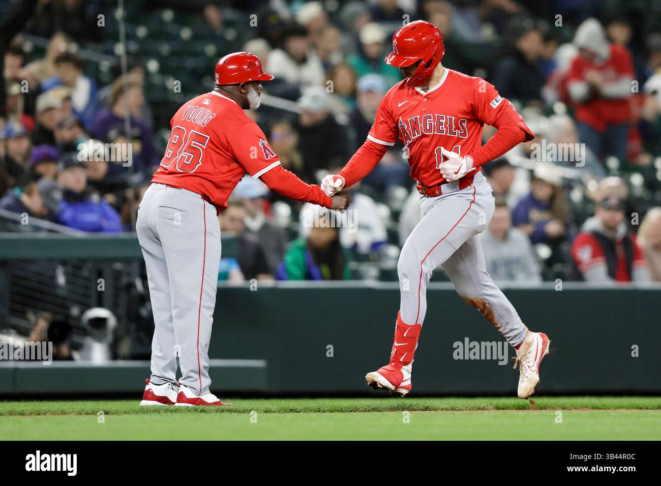 Los Angeles Angels' Logan O'Hoppe is greeted by Eric Young Sr. on his ...