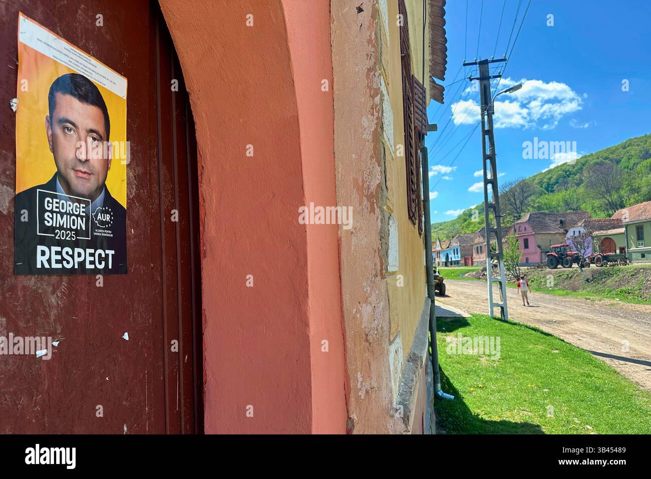 A presidential campaign poster is placed on a door in the village of ...