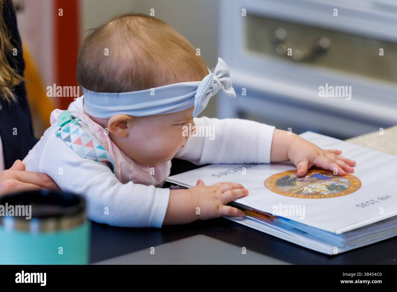 Grace Melton, 7-month-old, is held by her mother, Florida Rep. Fiona ...
