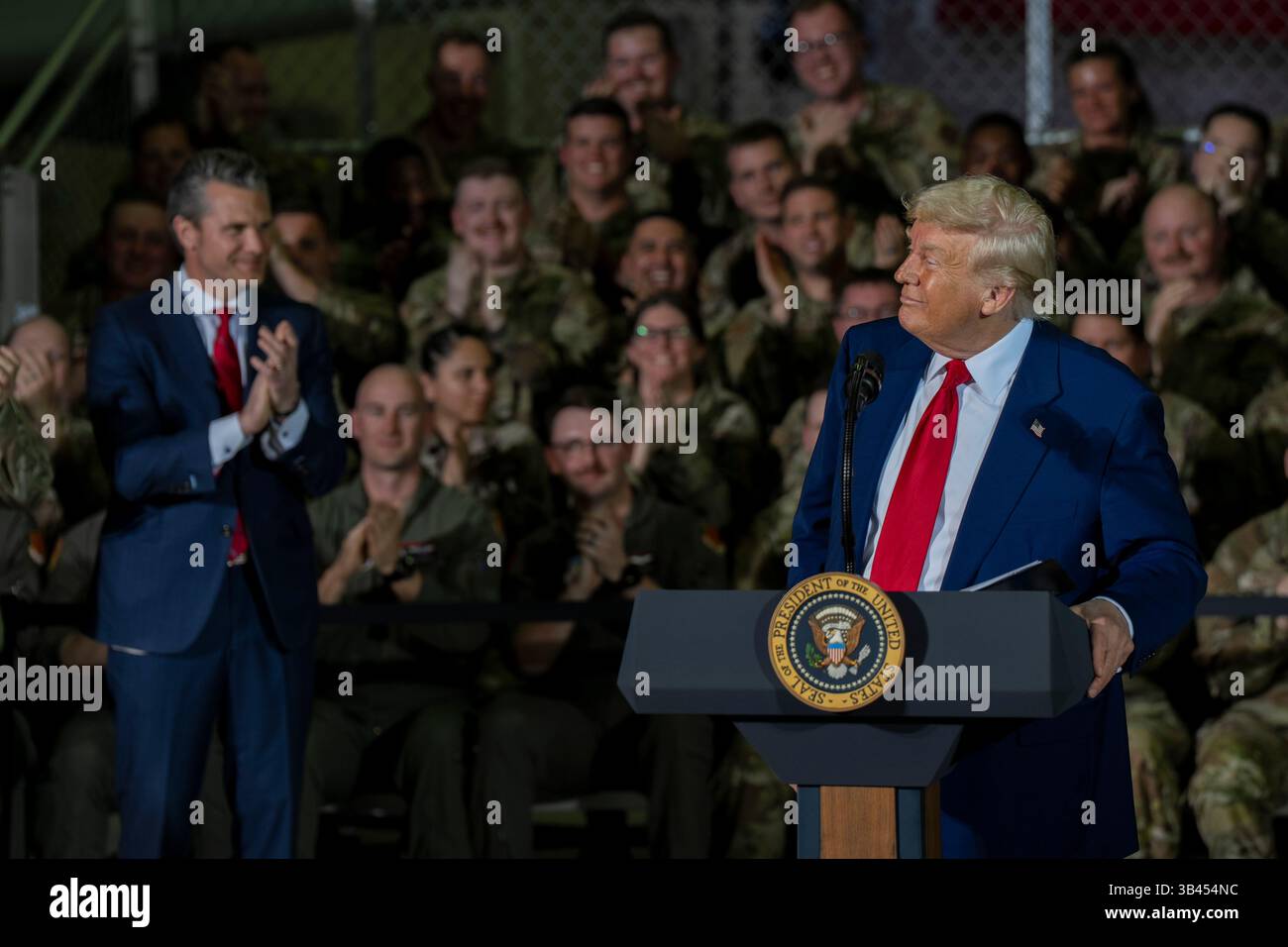President Donald Trump delivers remarks to troops alongside Secretary ...