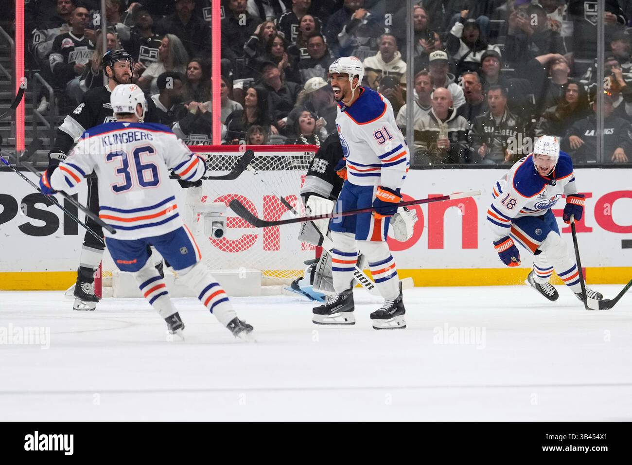Edmonton Oilers left wing Evander Kane, center, celebrates his goal ...