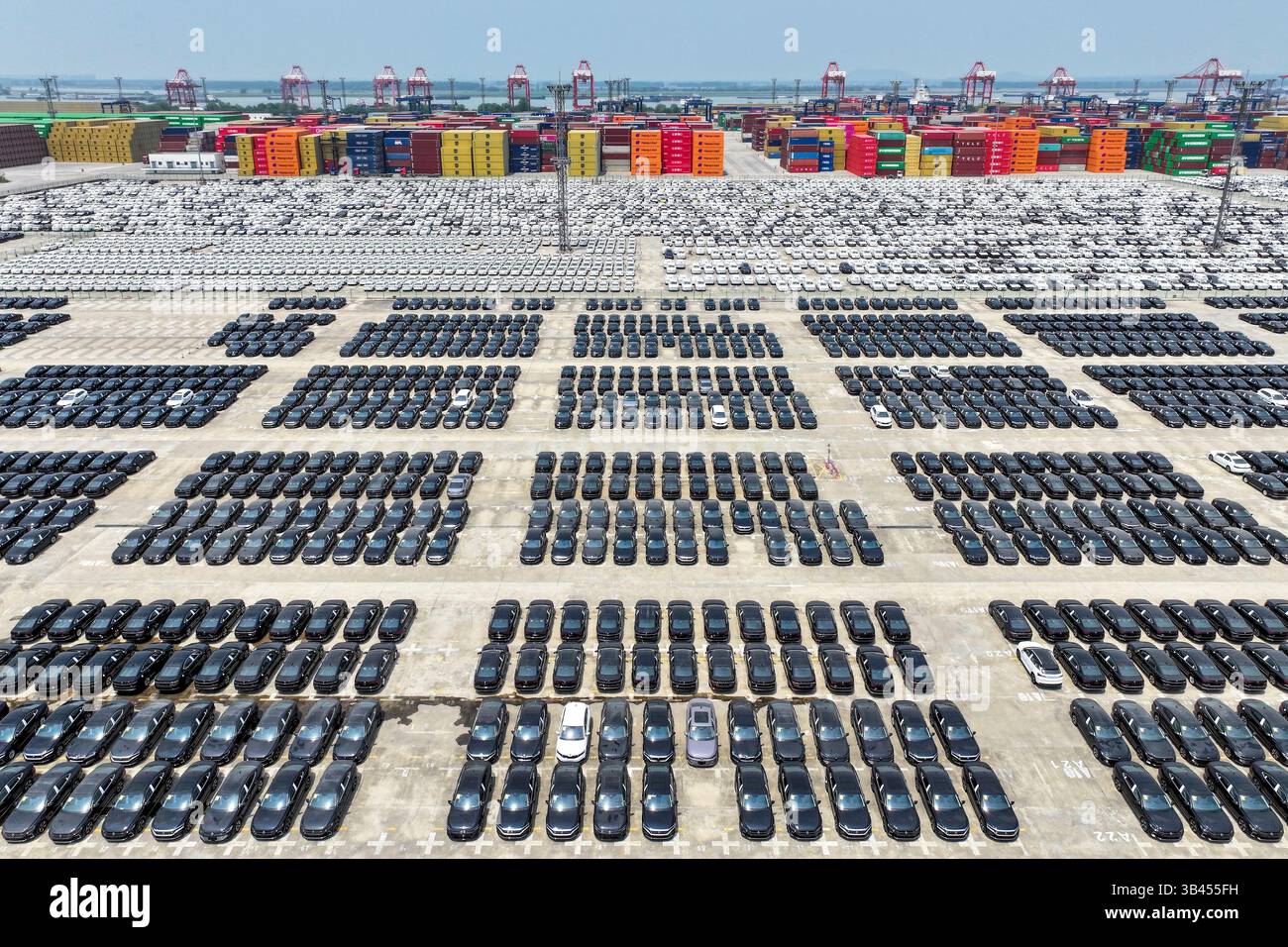 Aerial view of new cars waiting for shipment to overseas markets in ...