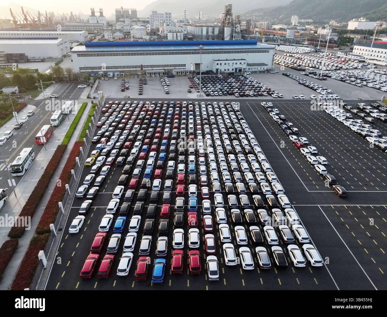 Aerial view of new cars waiting for shipment to overseas markets in ...
