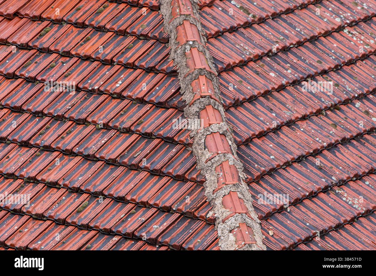 Weathered Corner: Red Ceramic Rooftop Stock Photo - Alamy