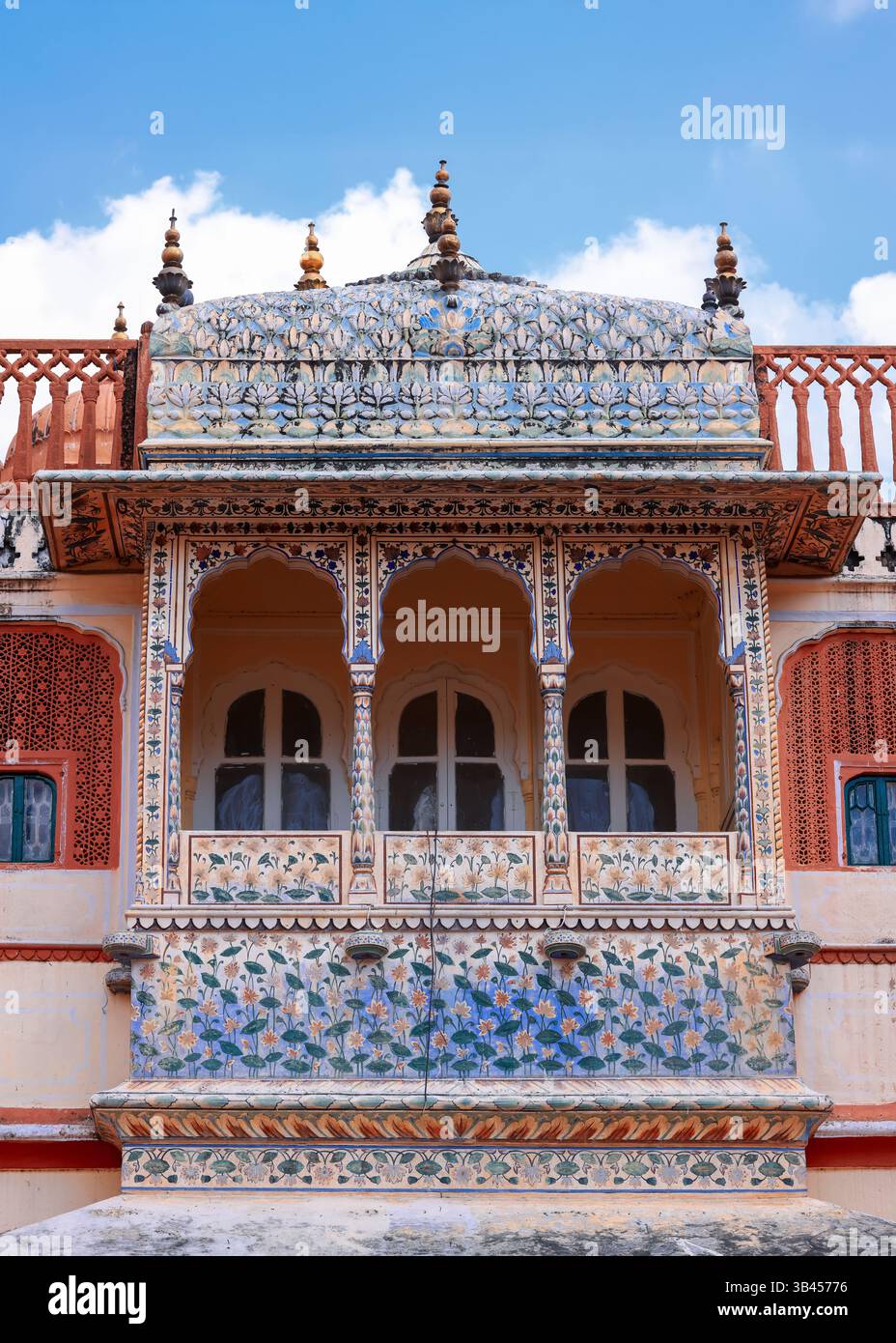 Arches and balcony of Historic City palace in Jaipur city, Rajasthan ...