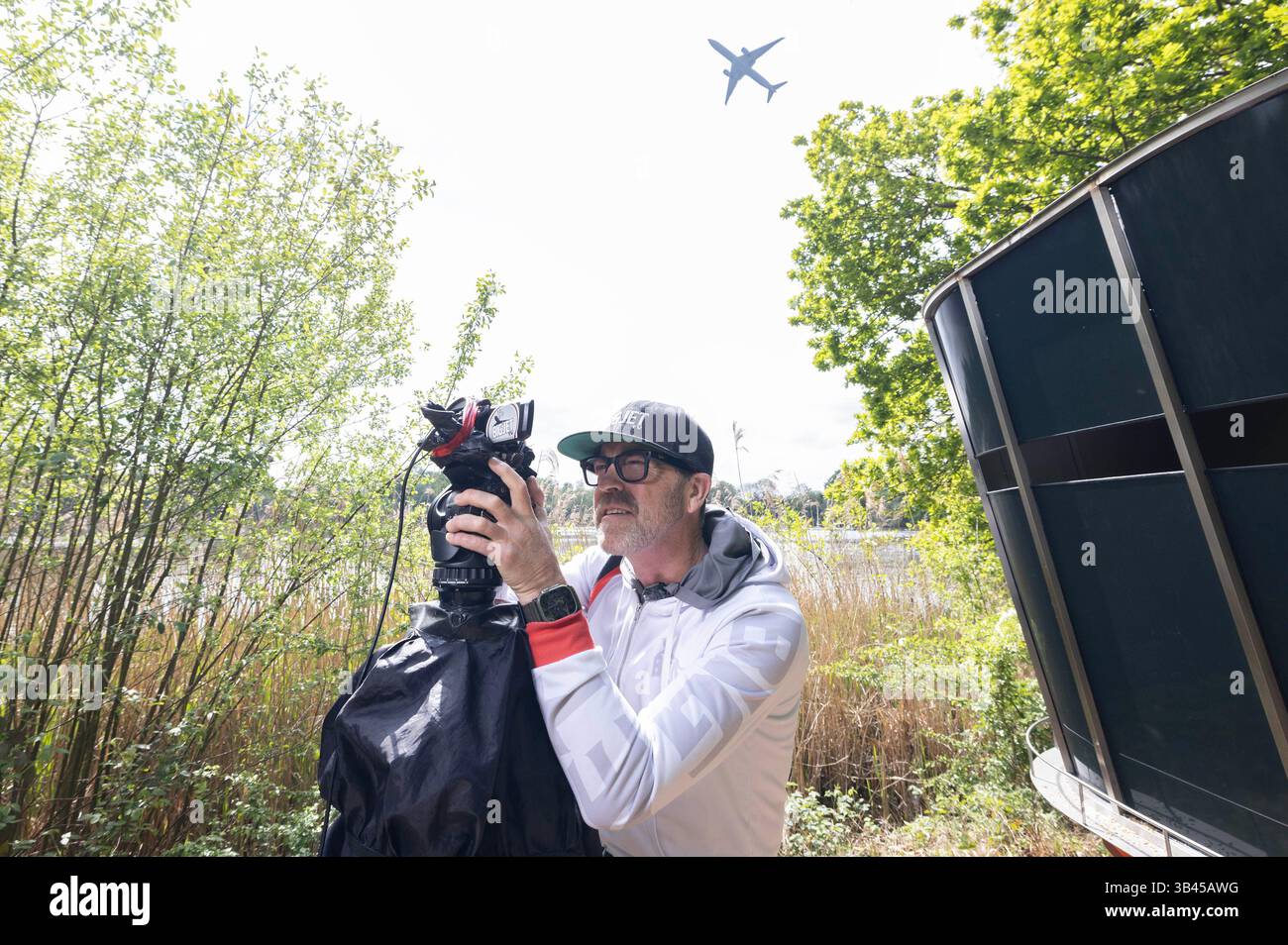EDITORIAL USE ONLY Plane spotter, Big Jet TV's Jerry Dyer uses a new ...
