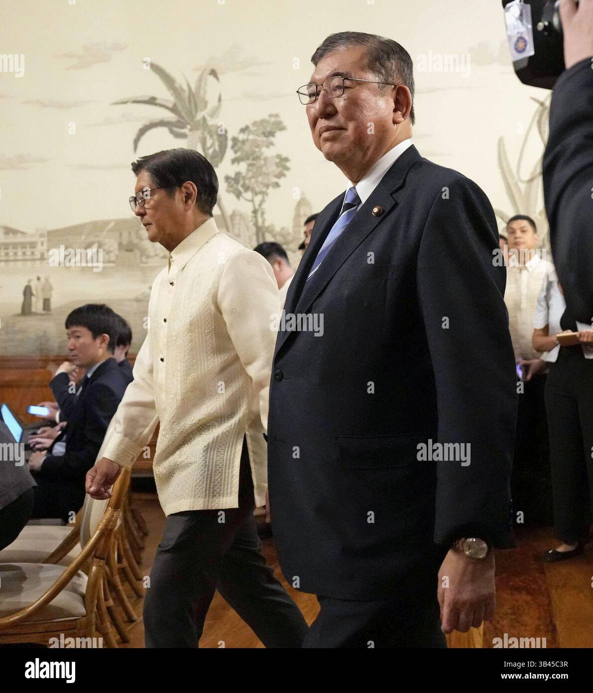 Japanese Prime Minister Shigeru Ishiba (R) and Philippine President ...