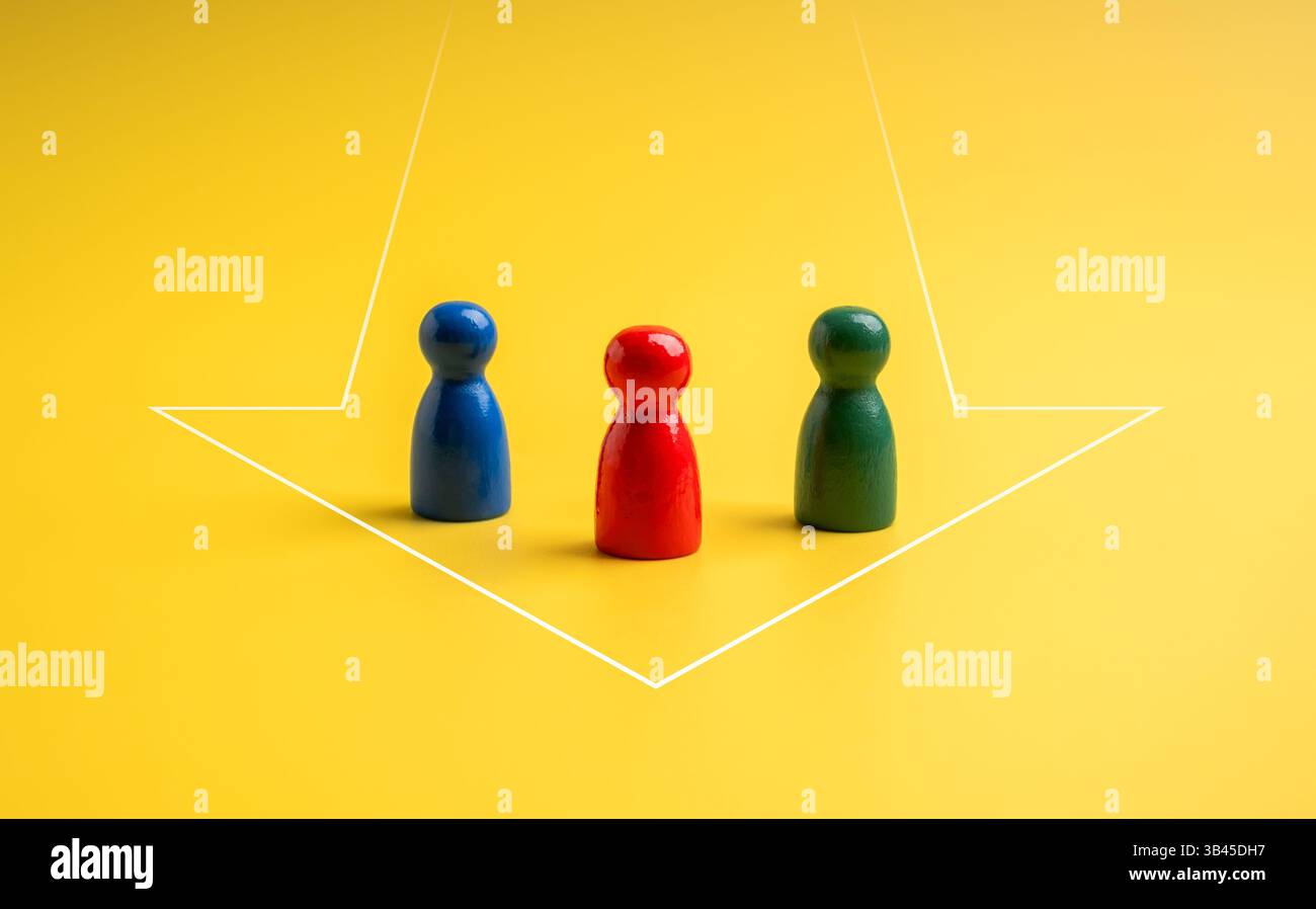 The red, green and blue, different colors of peg dolls standing ...