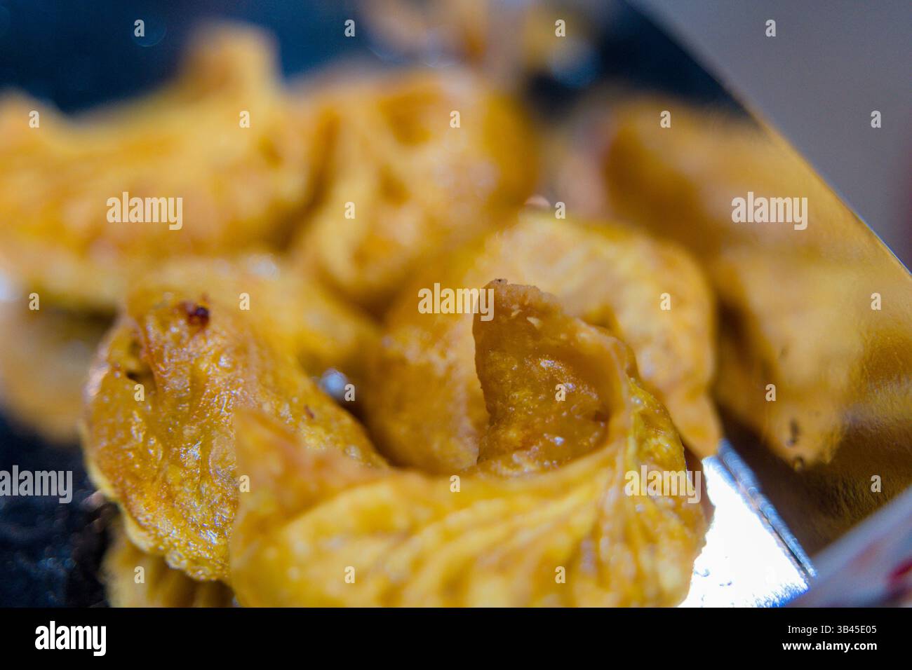 Freshly fried golden snacks hi-res stock photography and images - Alamy
