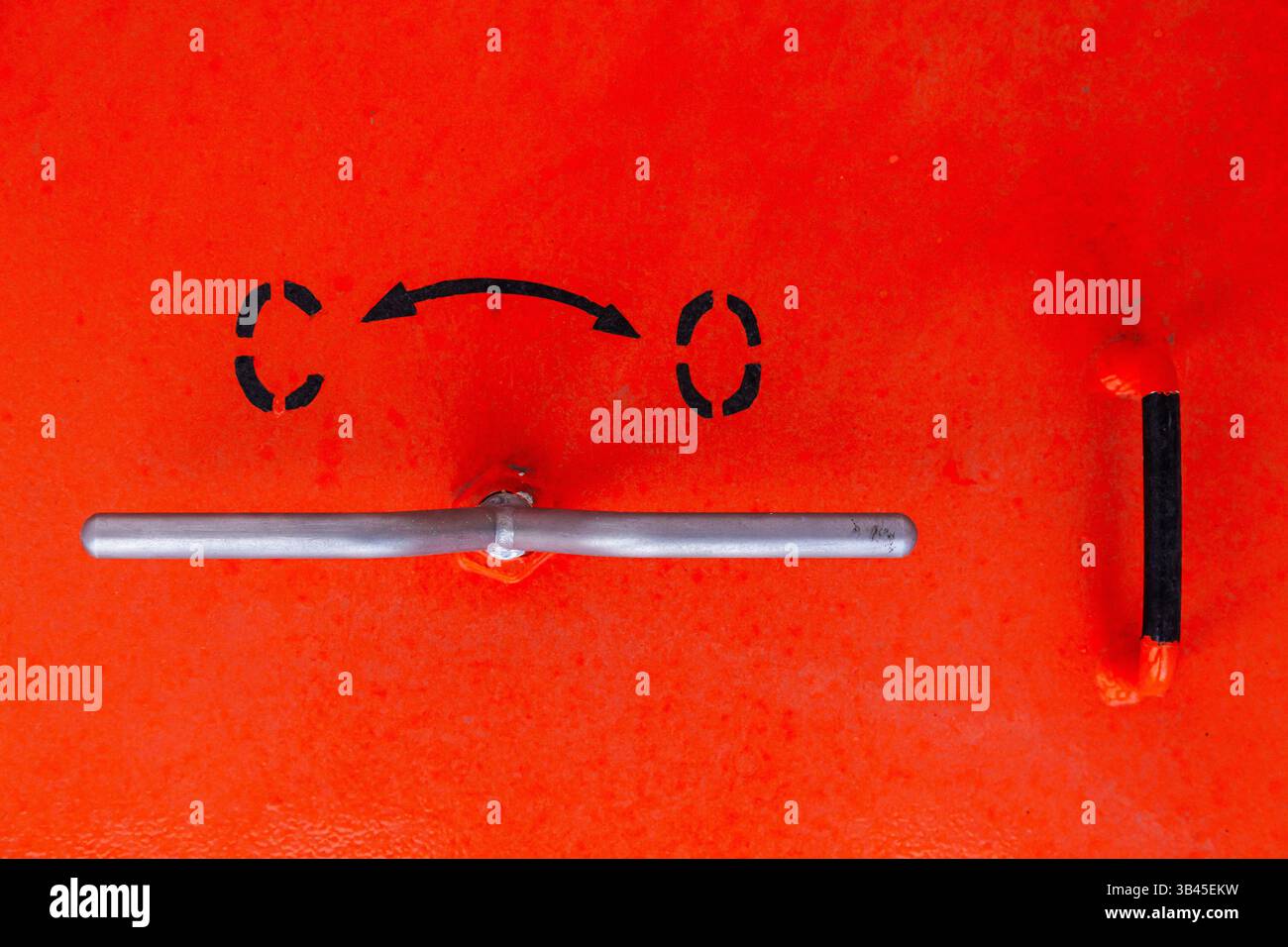 Emergency ship's iron hatch in red with a handle for sealing and ...
