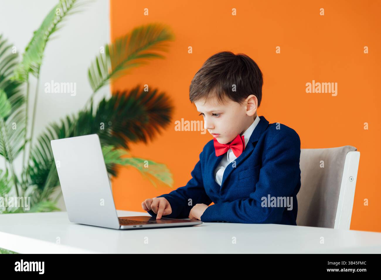School kids on laptop in class hi-res stock photography and images - Alamy