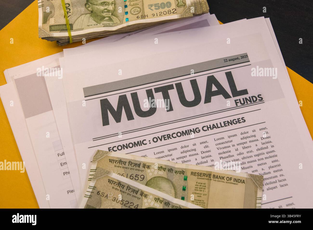 Financial documents on mutual funds shown with Indian currency ...