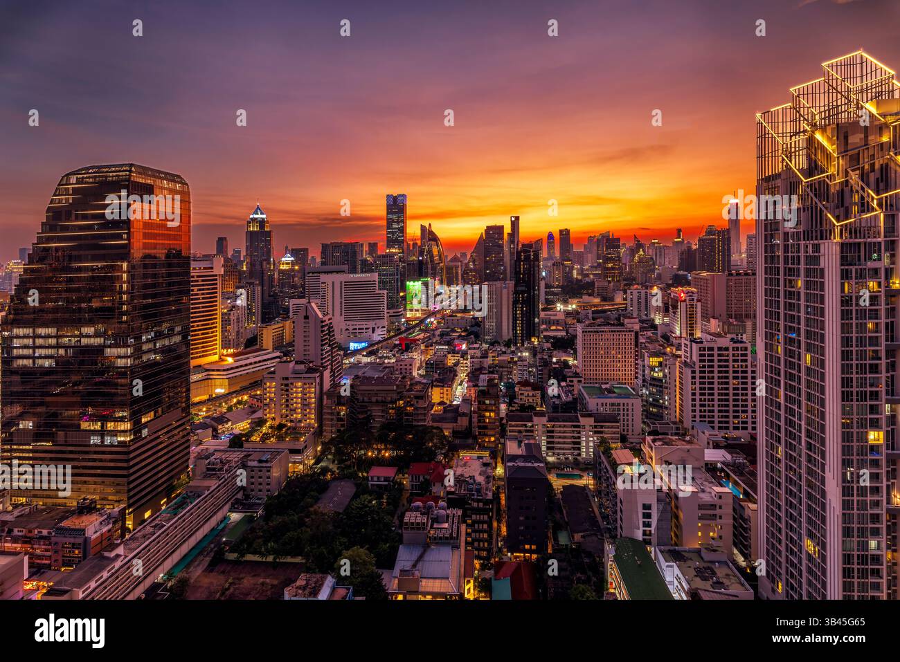 Bangkok high rise city centre buildings skyline at sunset, Thailand ...