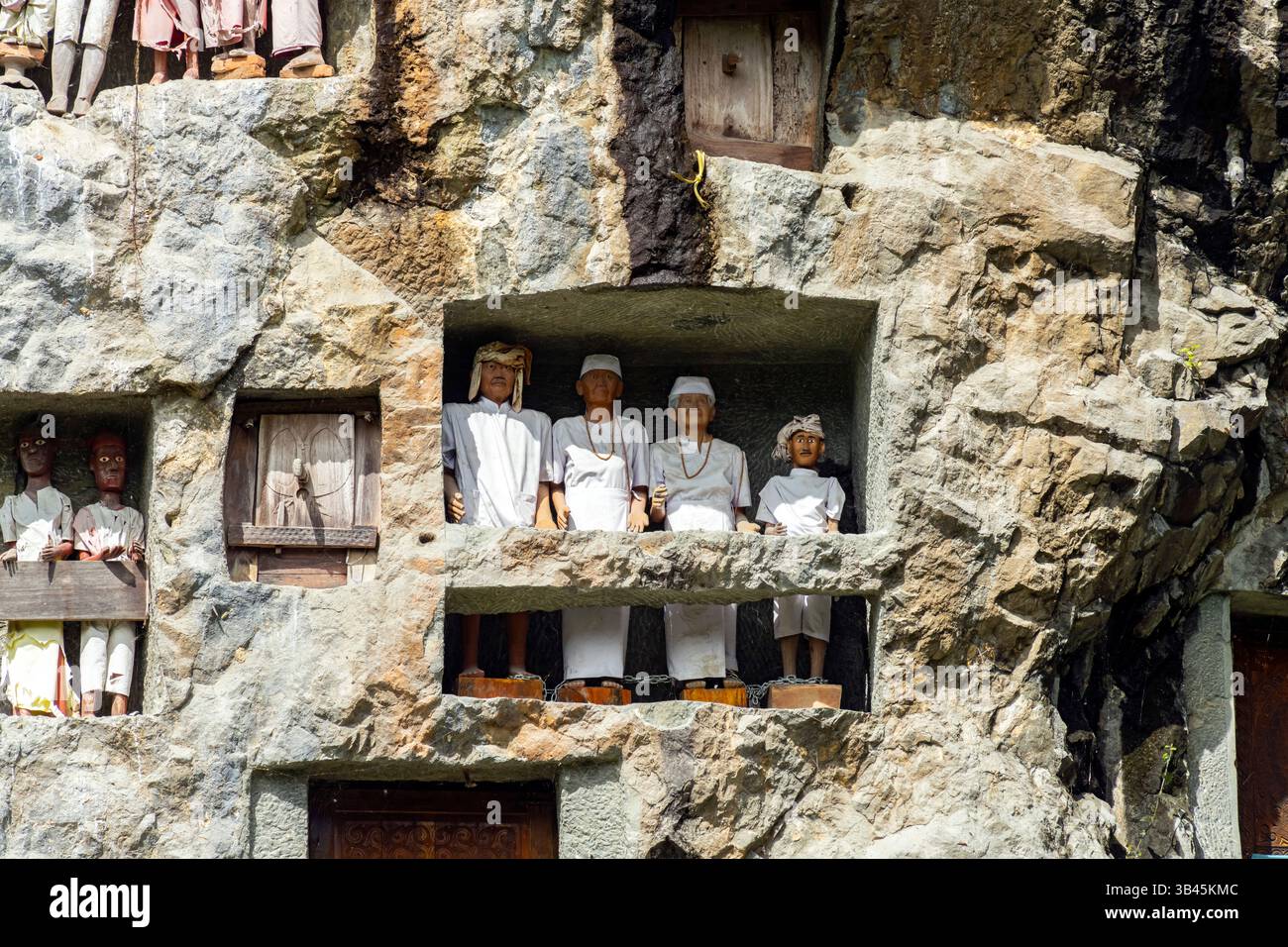 Spectacular Life-size wooden effigies or tau tau of the deceased are ...