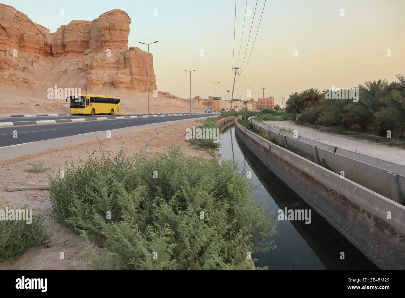 Fresh water runs below the western pillars of Al Qarah Mountain in the ...