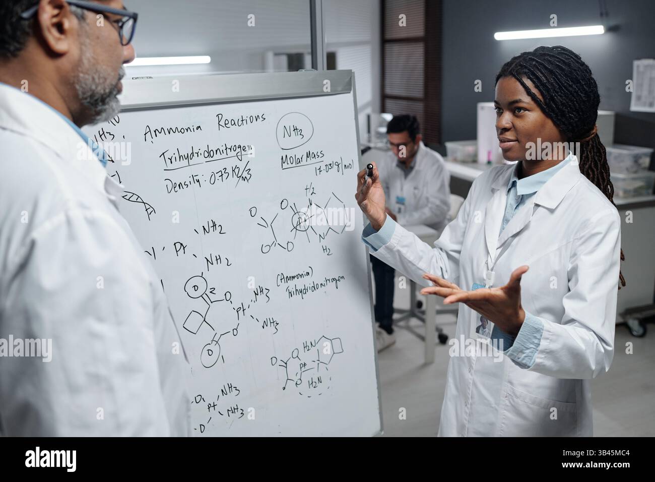 Laboratory scene two scientists hi-res stock photography and images - Alamy