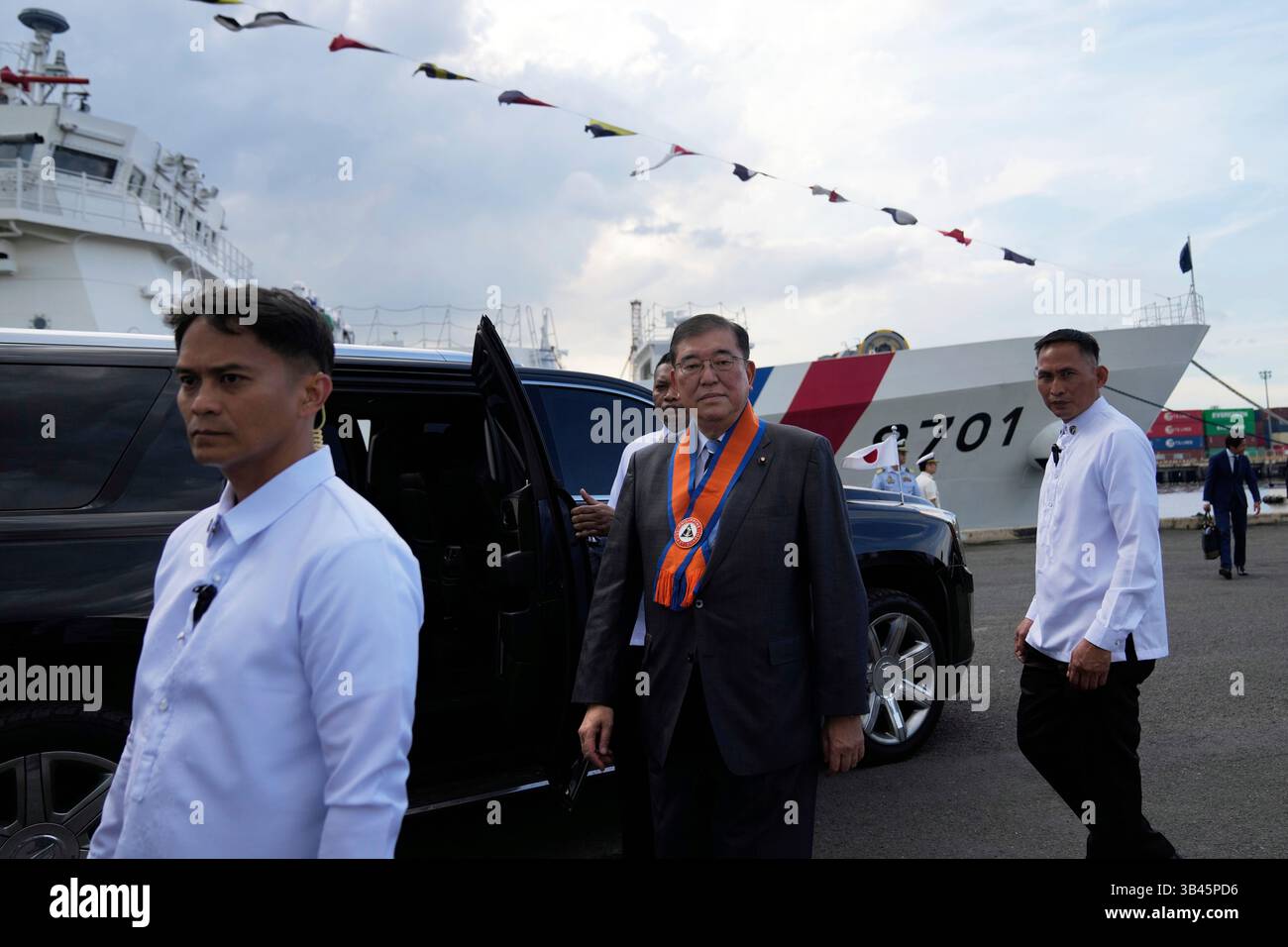 Japanese Prime Minister Shigeru Ishiba walks under tight security after ...
