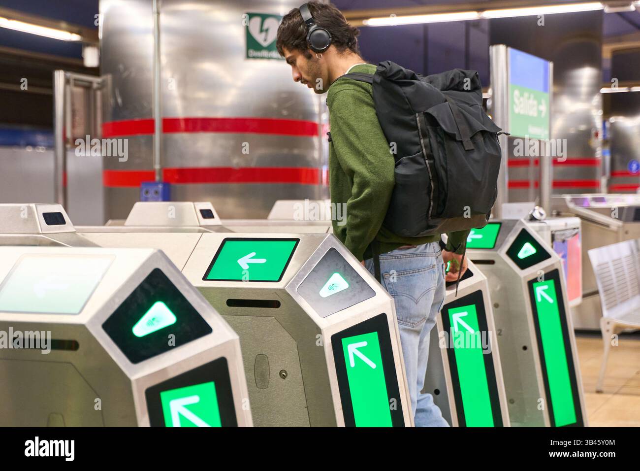 Commuter accessing public transport using an electronic ticket at a ...
