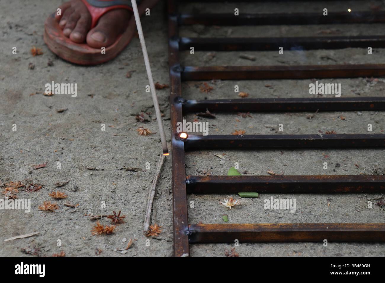Focus on welding a metal ladder frame together with a rod, and showing ...