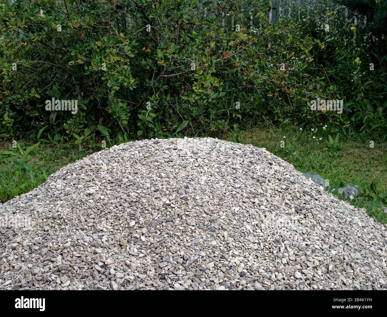 Pile of fine white rubble in the yard of a rural house, Russia Stock ...