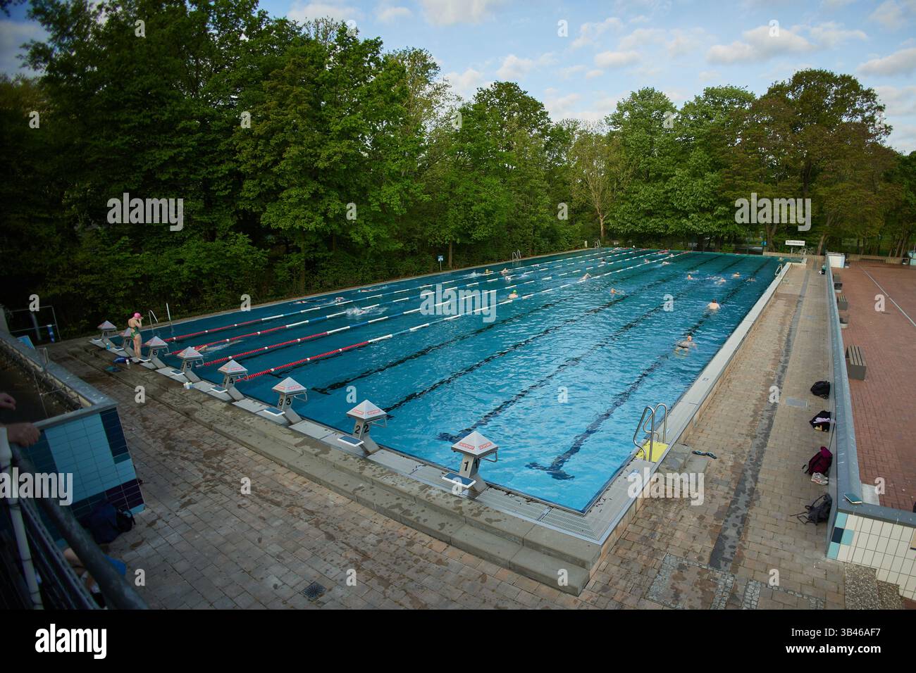 30 April 2025, Berlin: Swimmers do their lengths in the Prinzenbad on ...
