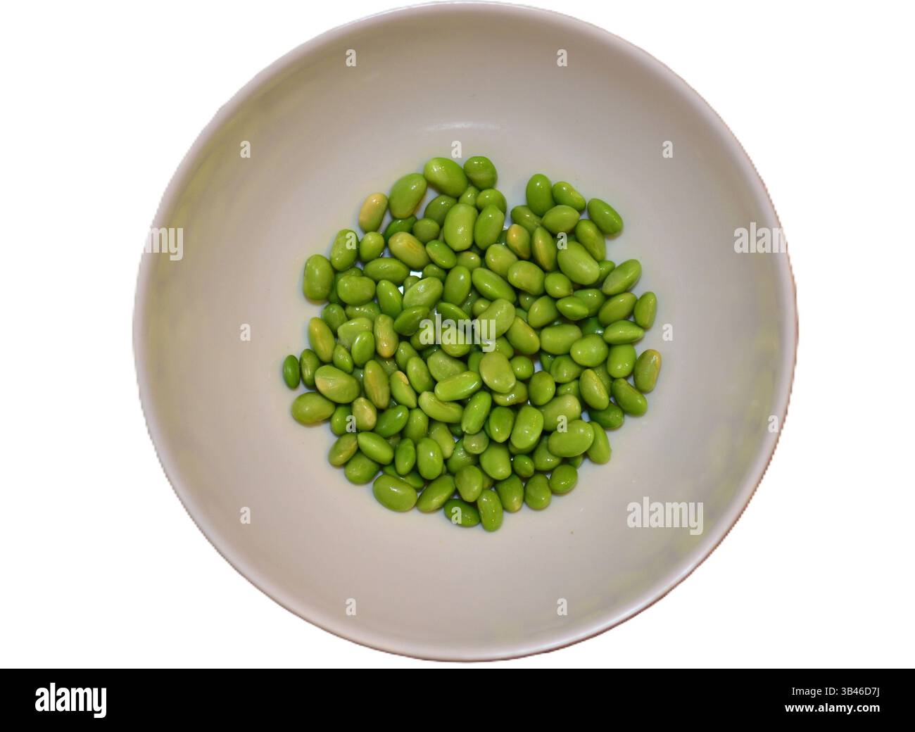 A half empty bowl of green beans isolated on white top view plain ...