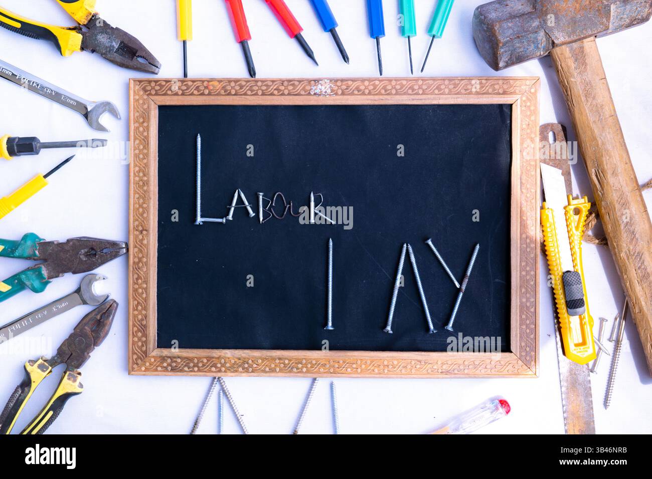 Collection of essential hardware tools like Screwdriver, hammer, Wrench ...