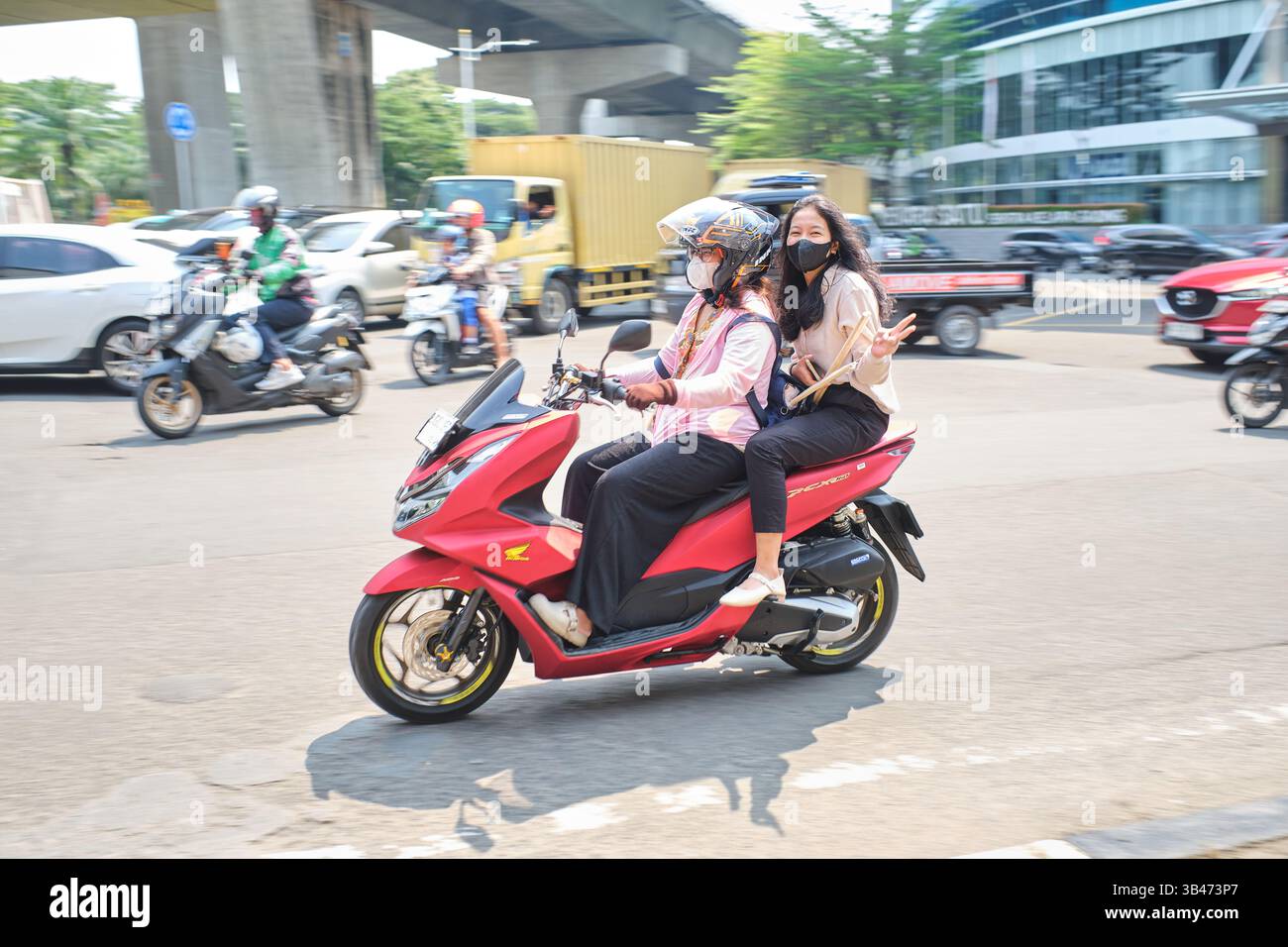 Fast moving Motorcycles or Bikers while background is in motion blur on ...