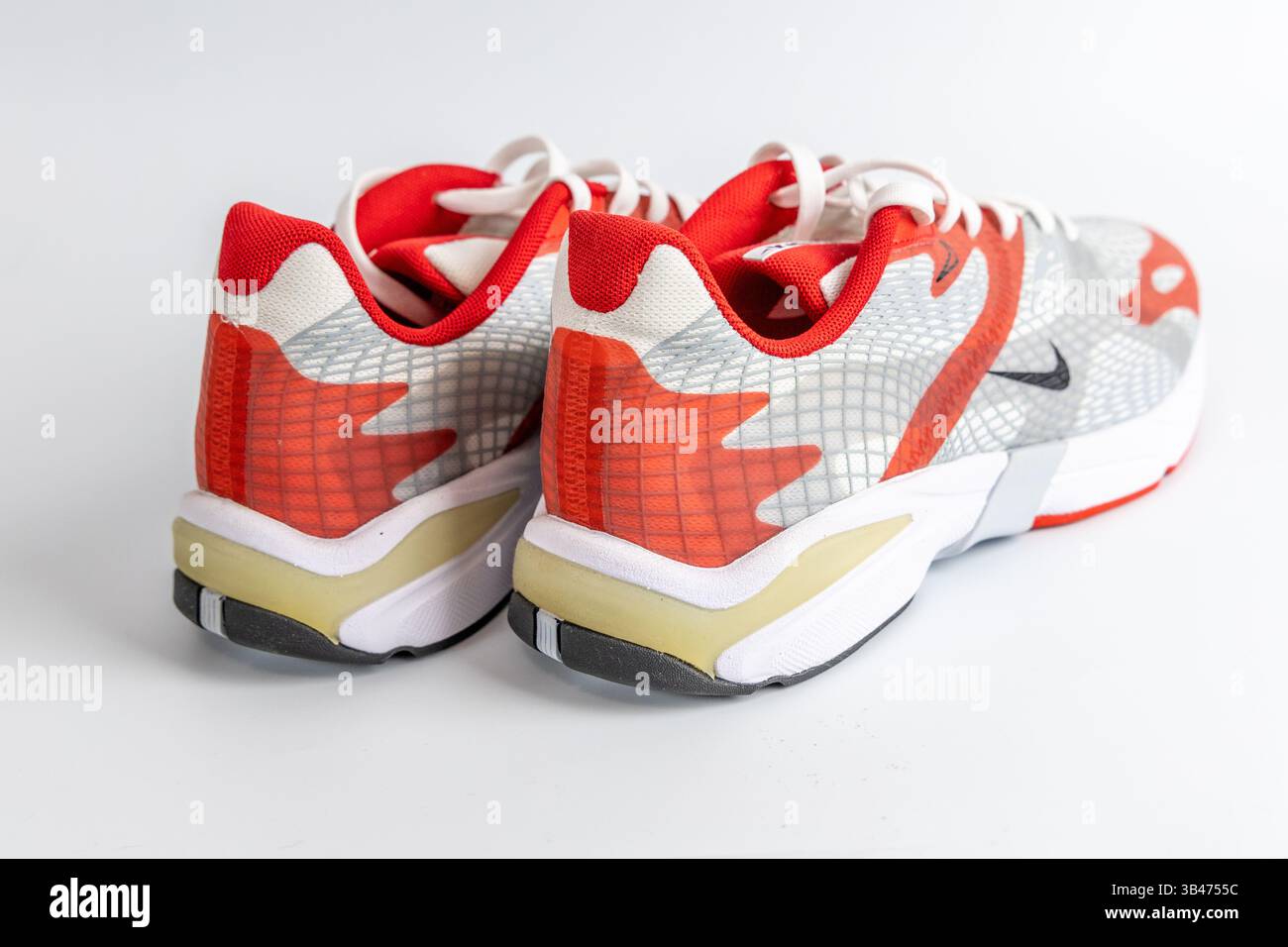 Bristol , UK- December 30, 2024: Nike running shoes with red and gray ...