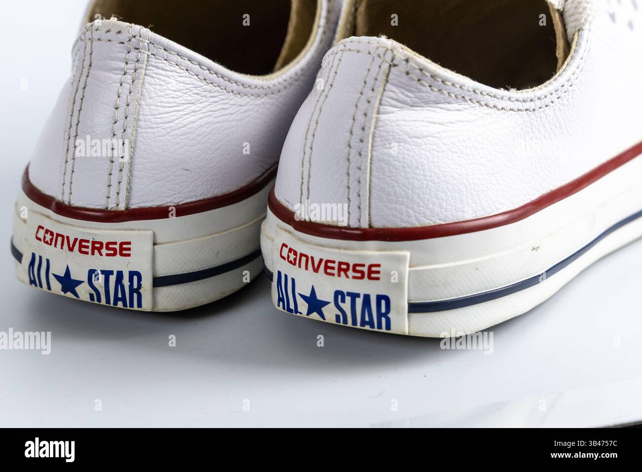 Bristol , UK- December 30, 2024: Close-up of worn white Converse All ...
