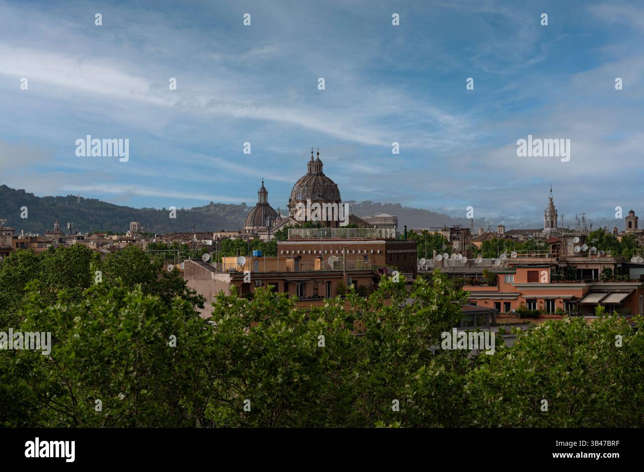 A scenic view over Rome highlighting its iconic dome architecture and ...