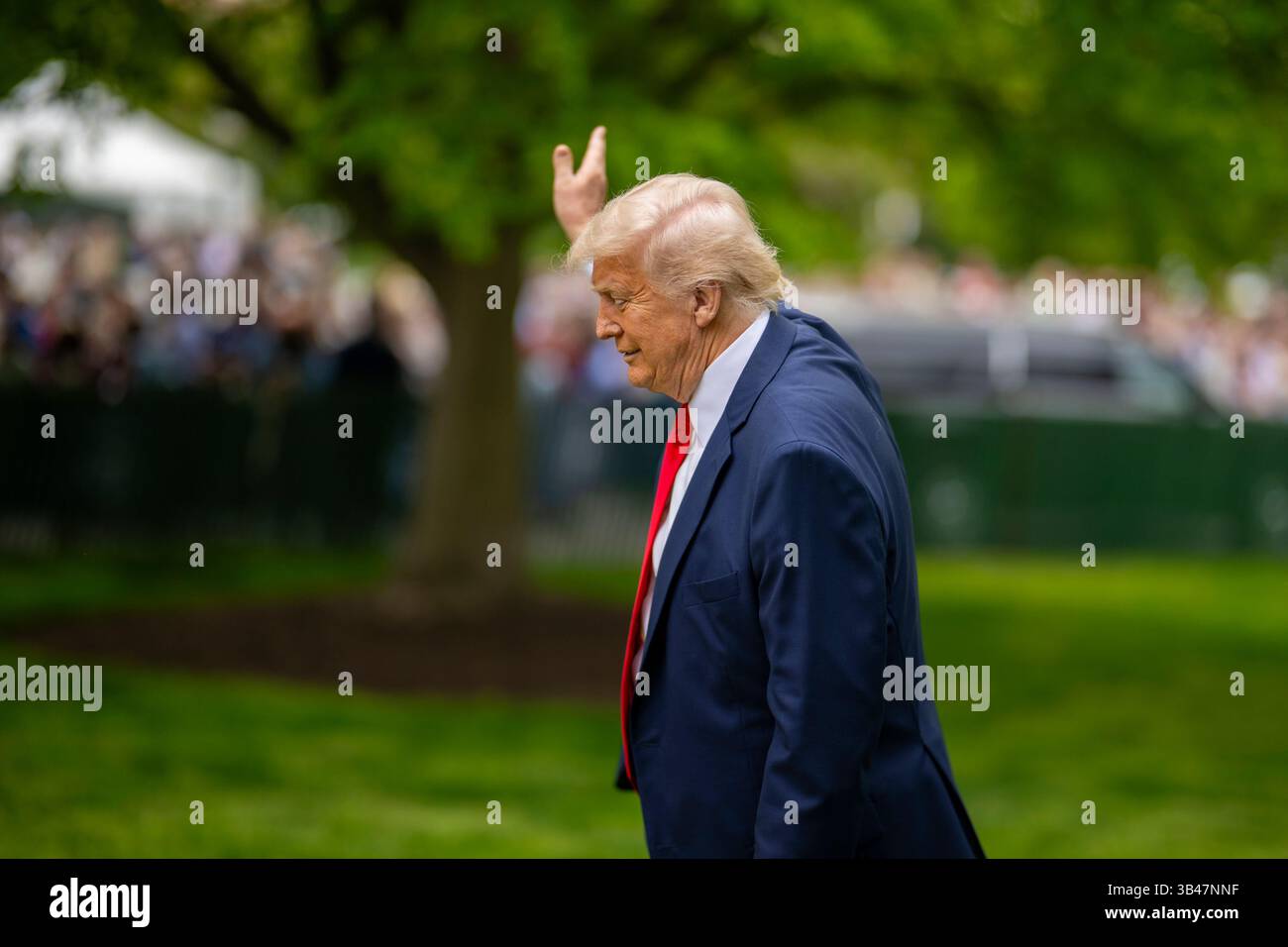 WASHINGTON DC, USA - 21 April 2025 - US President Donald Trump waves as ...