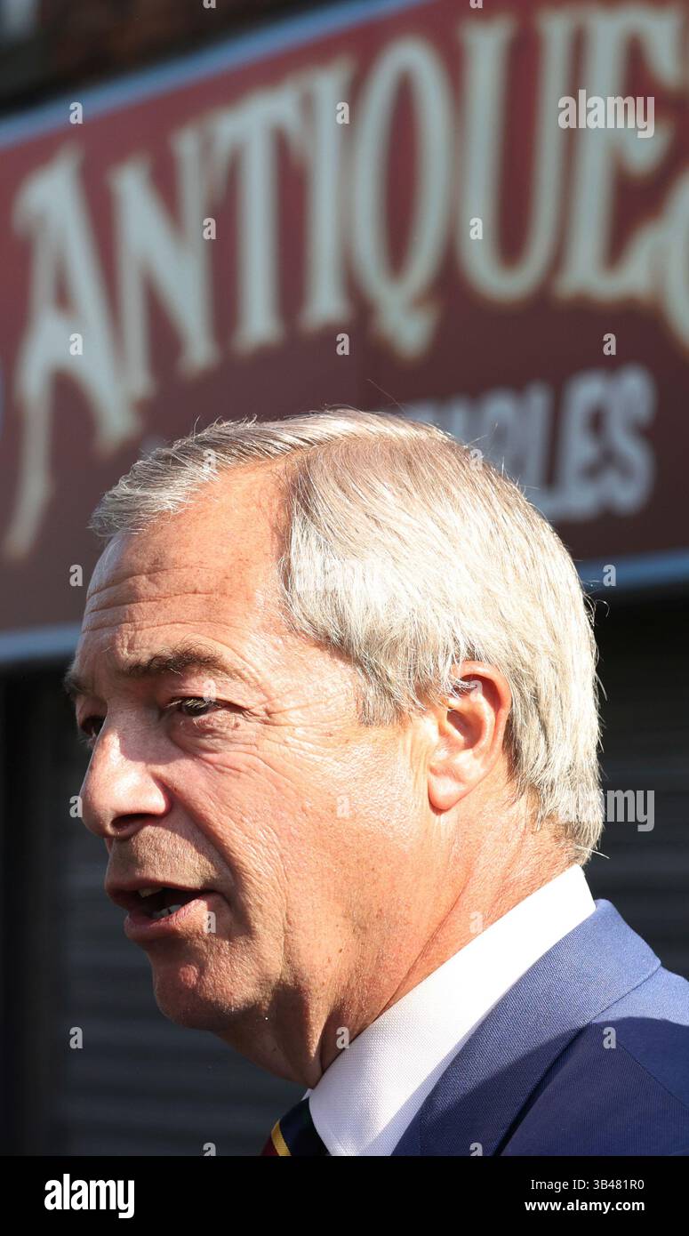 Reform UK leader Nigel Farage speaks as he campaigns with Reform UK ...