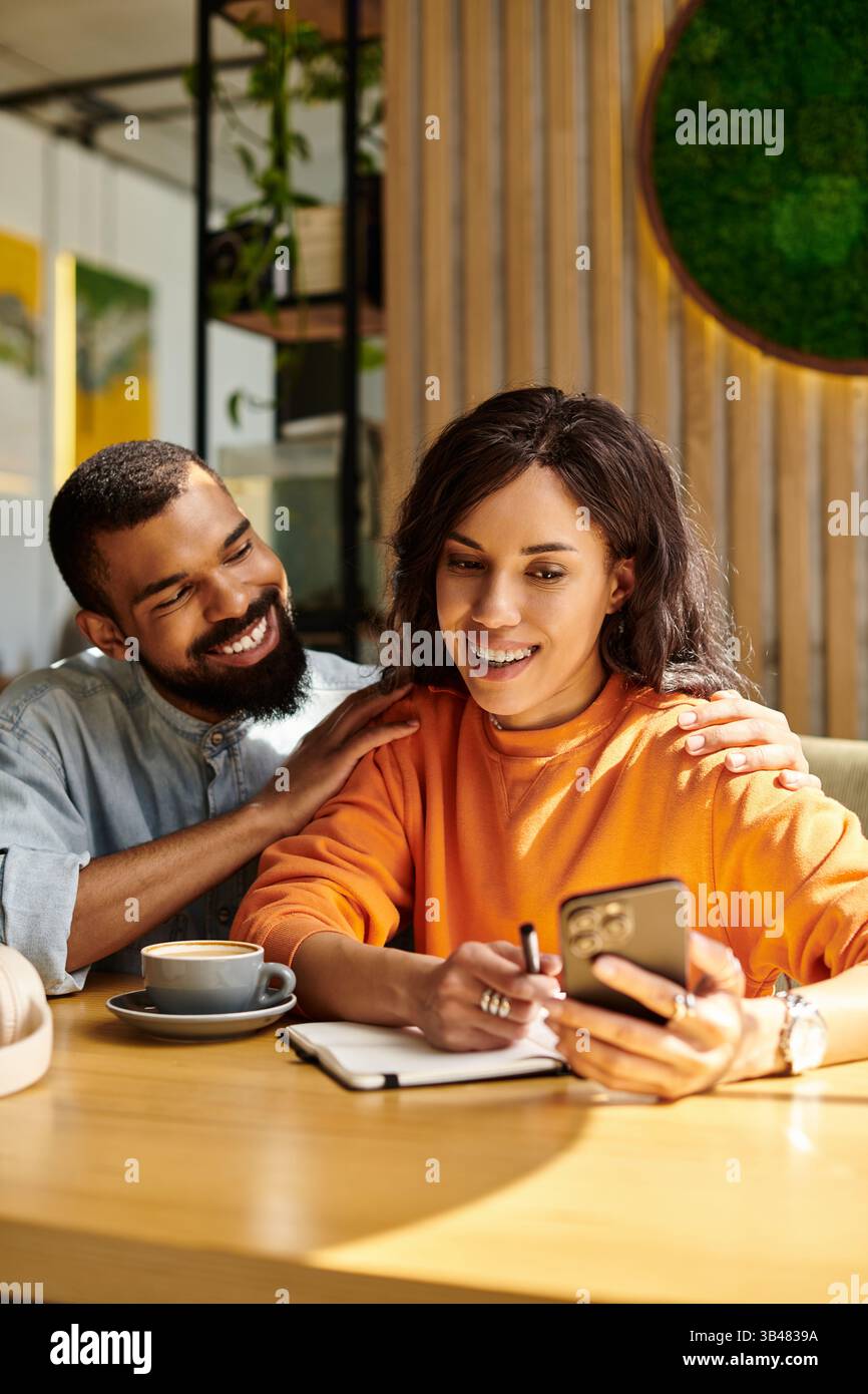 A couple enjoys their time together, laughing and sharing moments over ...