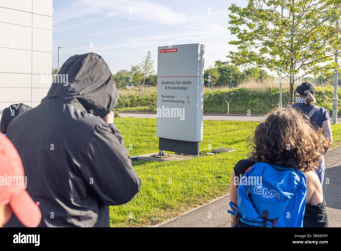 Samlesbury, UK. 30 APR, 2025. Activists walk to the entrance of ASK as ...