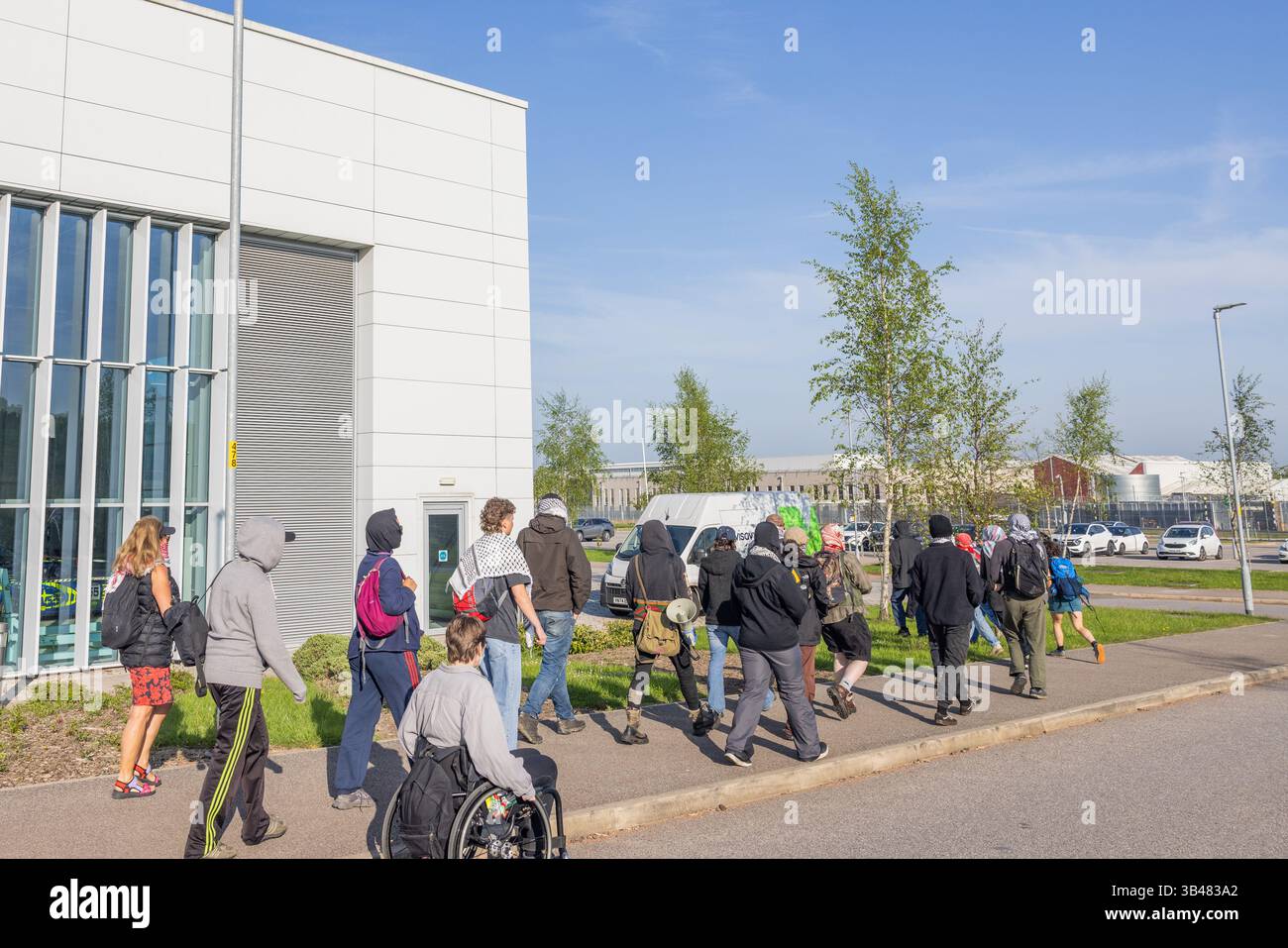 Samlesbury, UK. 30 APR, 2025. Activists walk to the entrance of ASK as ...