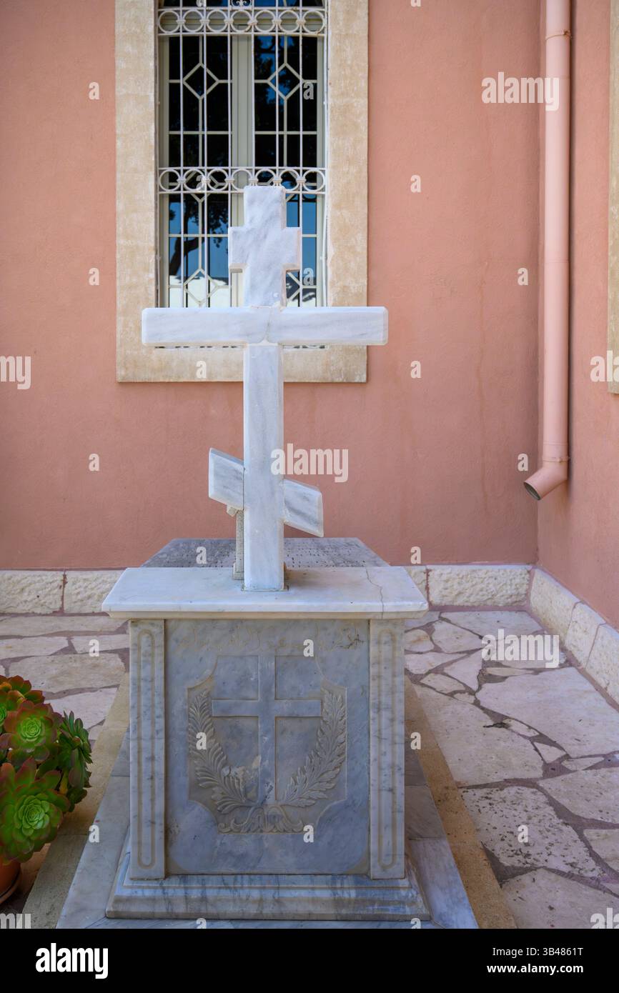 Marble Russian Orthodox cross in the courtyard of the Church of holy ...