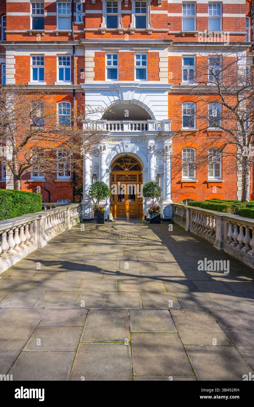 The red brick building features elegant architecture with a grand ...