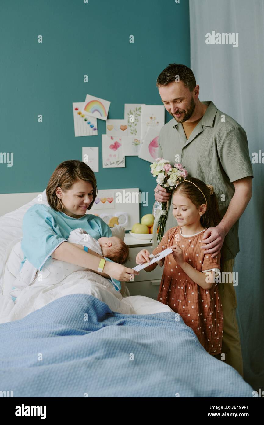 Welcoming new addition family hi-res stock photography and images - Alamy