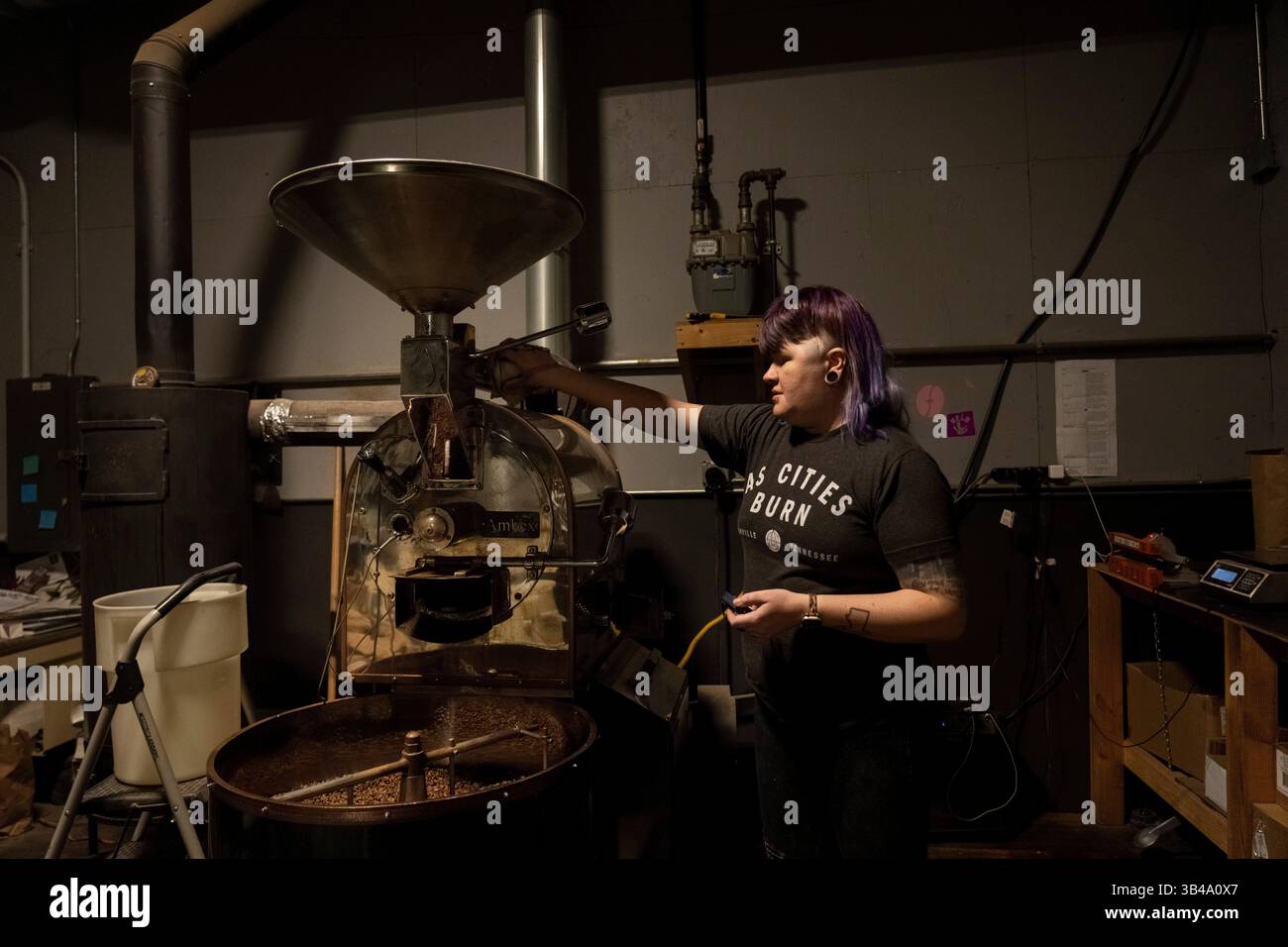 Renee Colon, co-owner of Fuego Coffee Roasters, operates her roasting ...