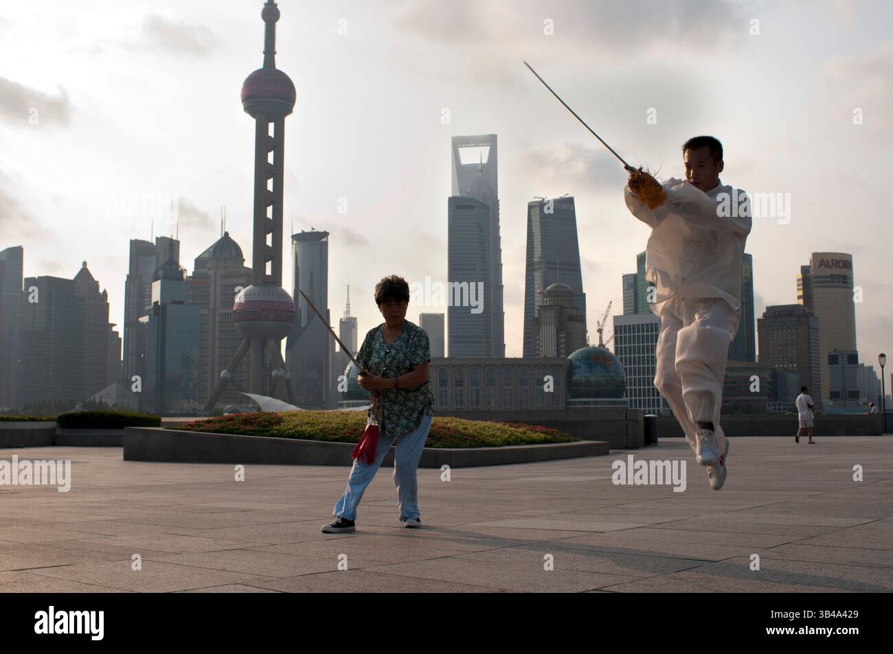 Jul 26, 2014 - Shanghai, China - Early morning tai chi exercises with ...