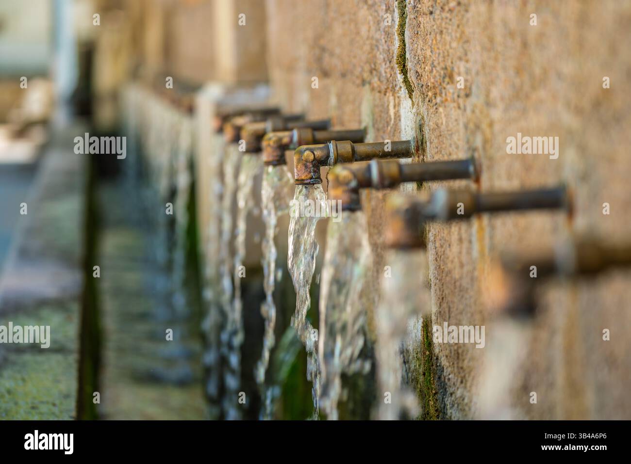 Clear water streams from metal hi-res stock photography and images - Alamy