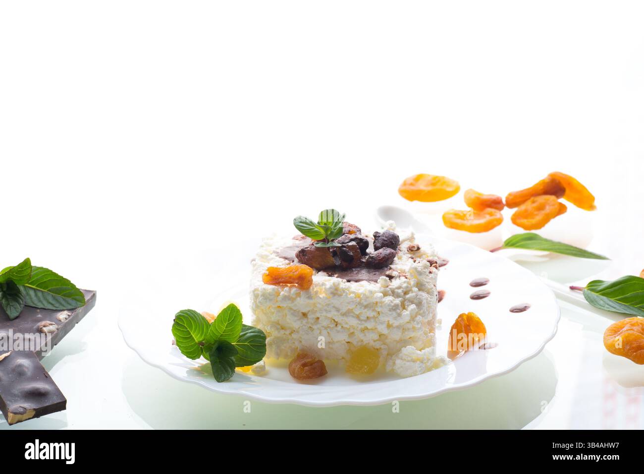 sweet cottage cheese breakfast in a plate with chocolate syrup with ...